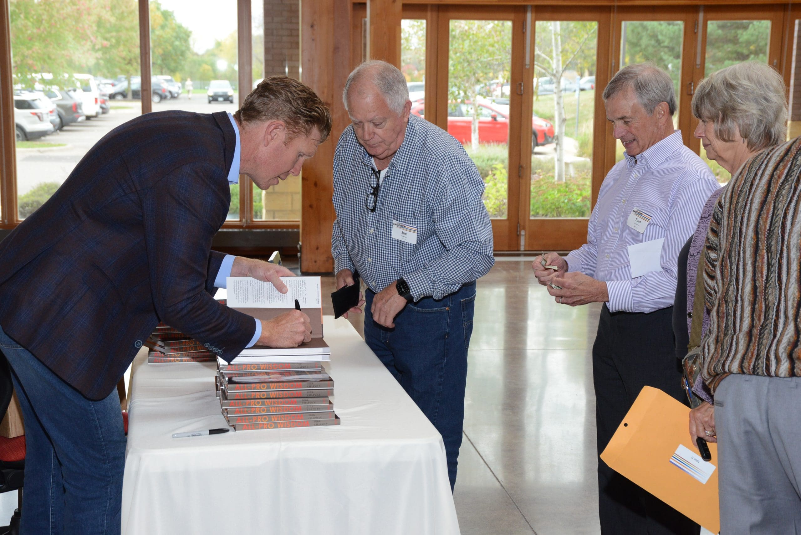 Signing Books (1) – Merrick, Inc.
